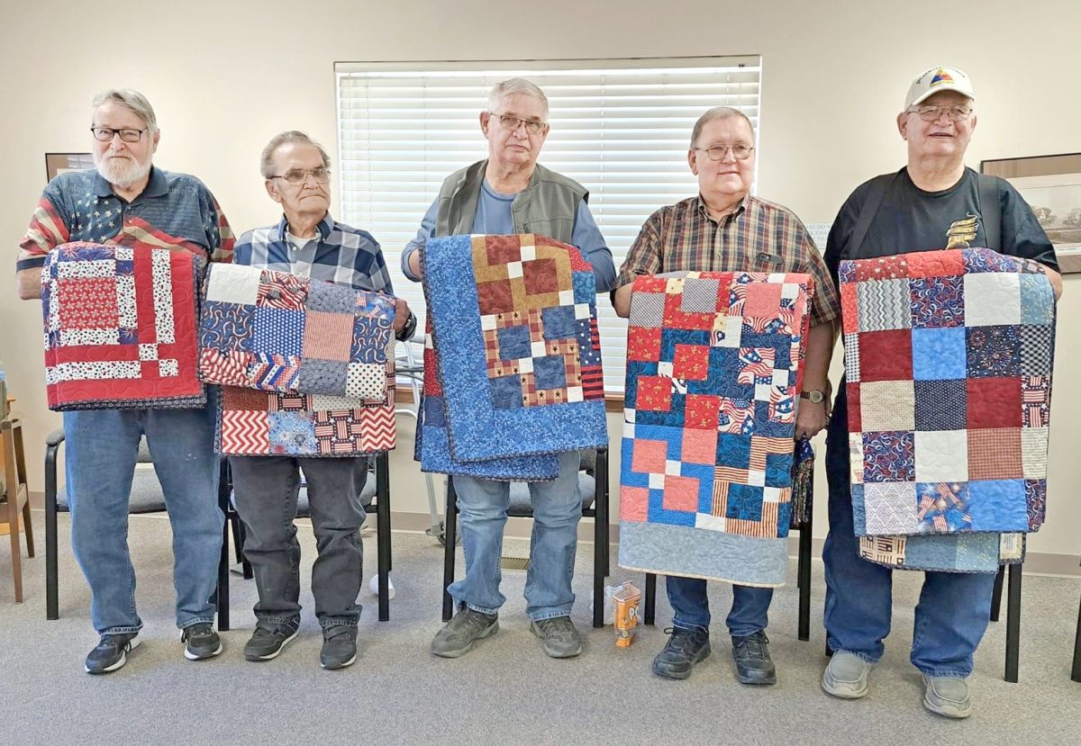 Veterans presented quilts at Gubser Easter gathering - Farmer Publishing